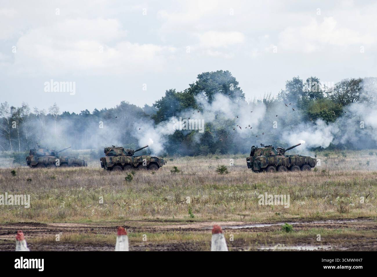 Armored vehicles fire during military exercises of Poland and NATO ...