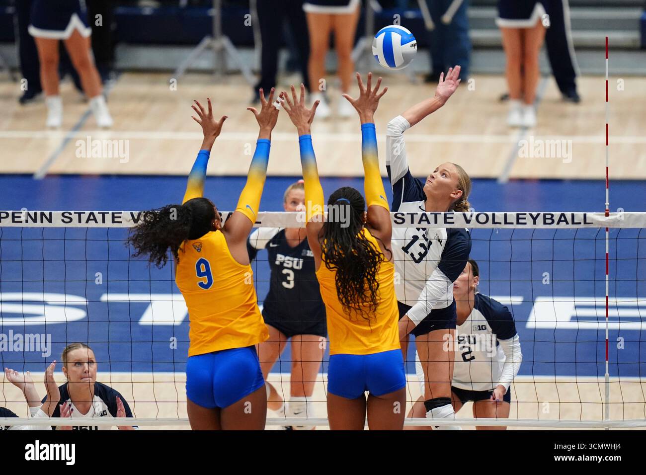 Penn State outside hitter Emmi Sellman (13) spikes the ball during an ...