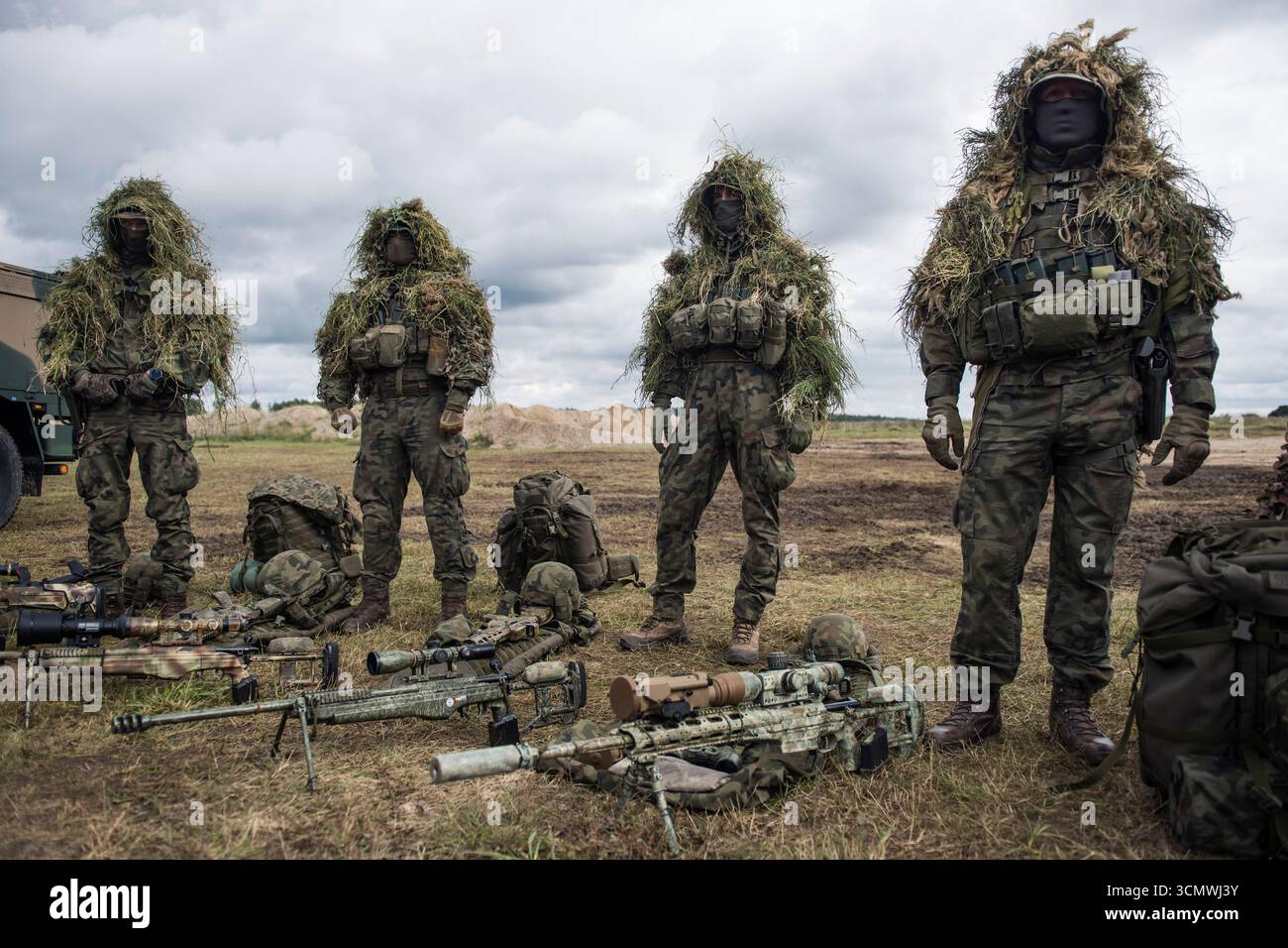 Polish snipers with rifles seen during military exercises of Poland and ...