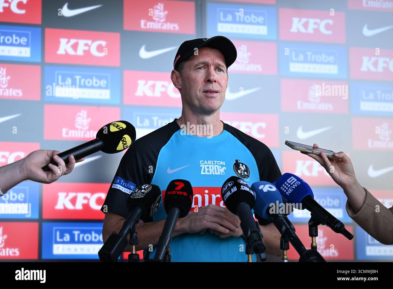 Collingwood Magpies head coach Craig McRae speaks to media during a ...