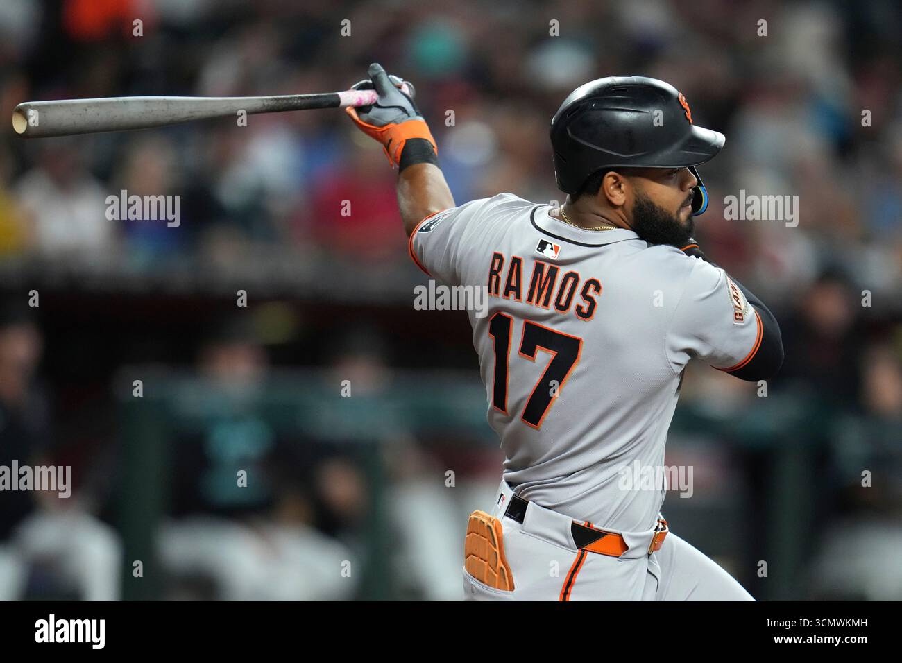 San Francisco Giants' Heliot Ramos follows through with his swing ...