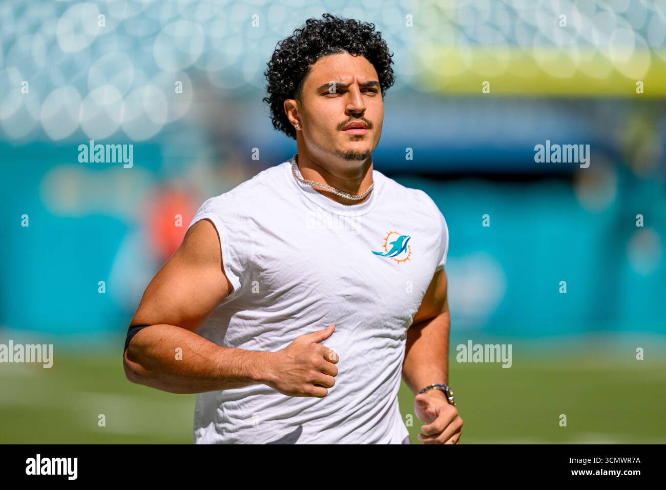 Miami Dolphins linebacker Jaelan Phillips runs on the field before an ...