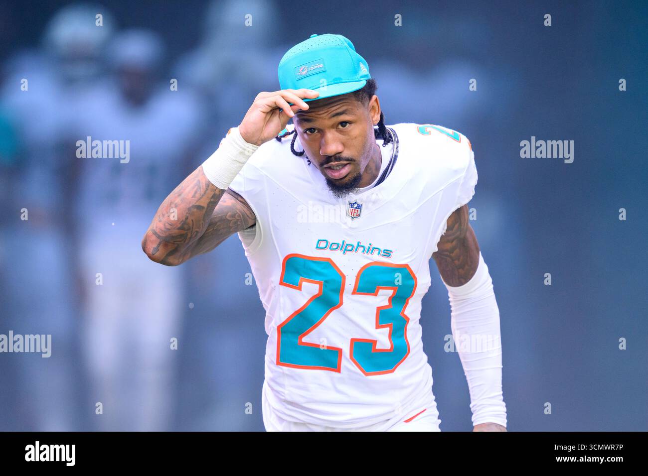 Miami Dolphins cornerback Jack Jones (23) runs onto the field during ...