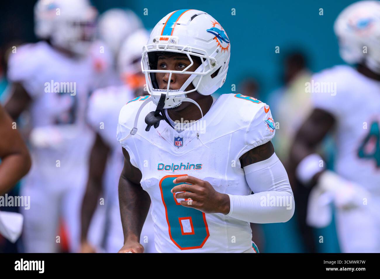 Miami Dolphins wide receiver Malik Washington (6) runs onto the field ...