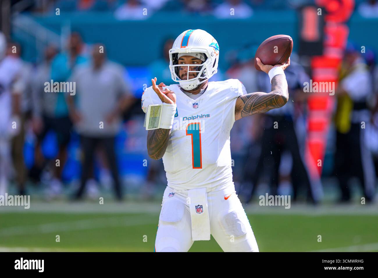 Miami Dolphins quarterback Tua Tagovailoa (1) throws the ball during an NFL football game ...