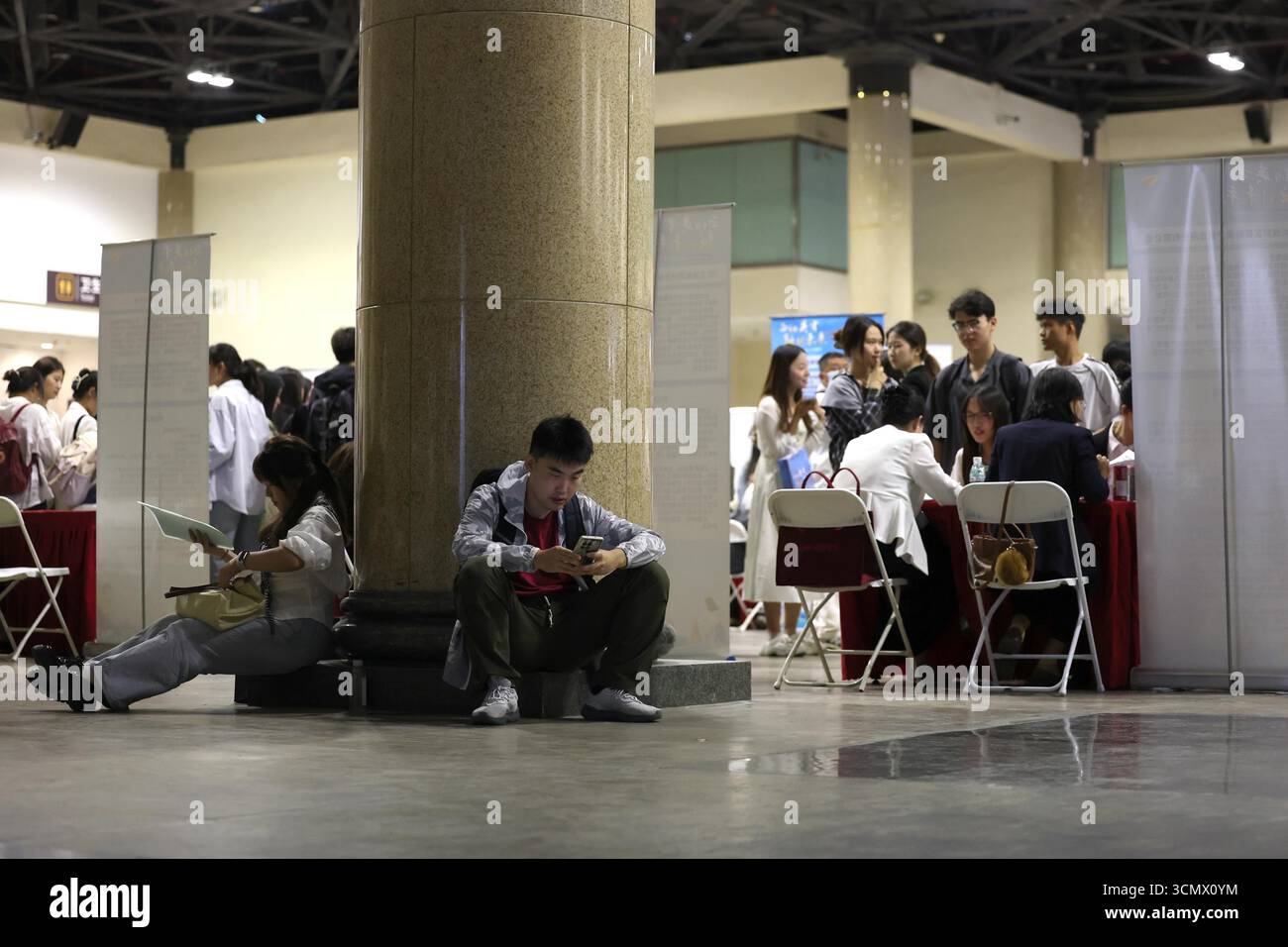 **CHINESE MAINLAND, HONG KONG, MACAU AND TAIWAN OUT** People look for ...