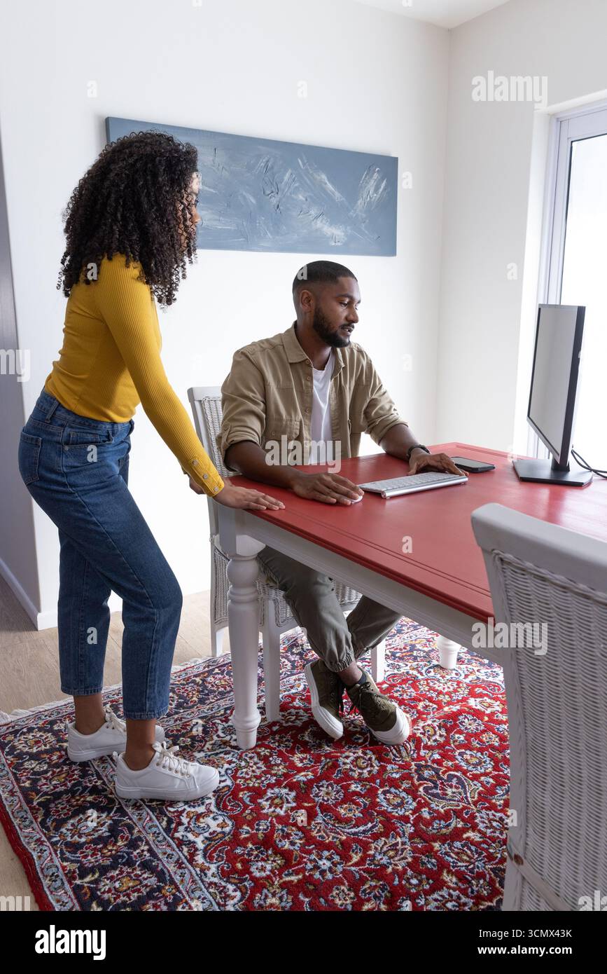 Collaborating woman in red hi-res stock photography and images - Alamy