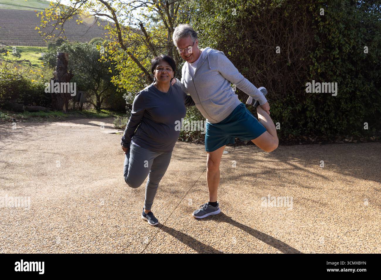 Athletic man performing quadriceps stretch hi-res stock photography and ...