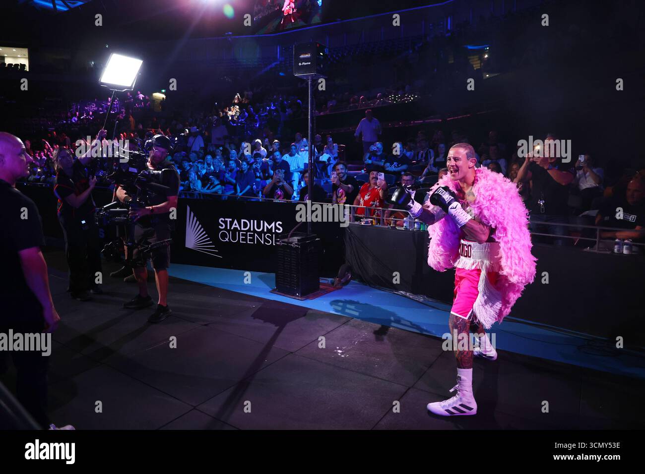 Rikki Naito ' The Flamingo' enters the ring against Jacob Ng during ...