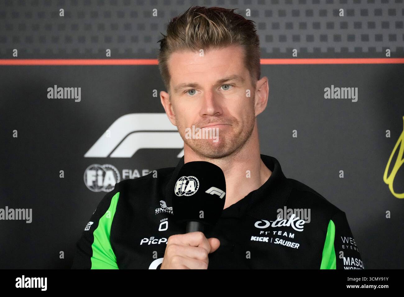 Kick Sauber driver Nico Hulkenberg of Germany attends a news conference ...