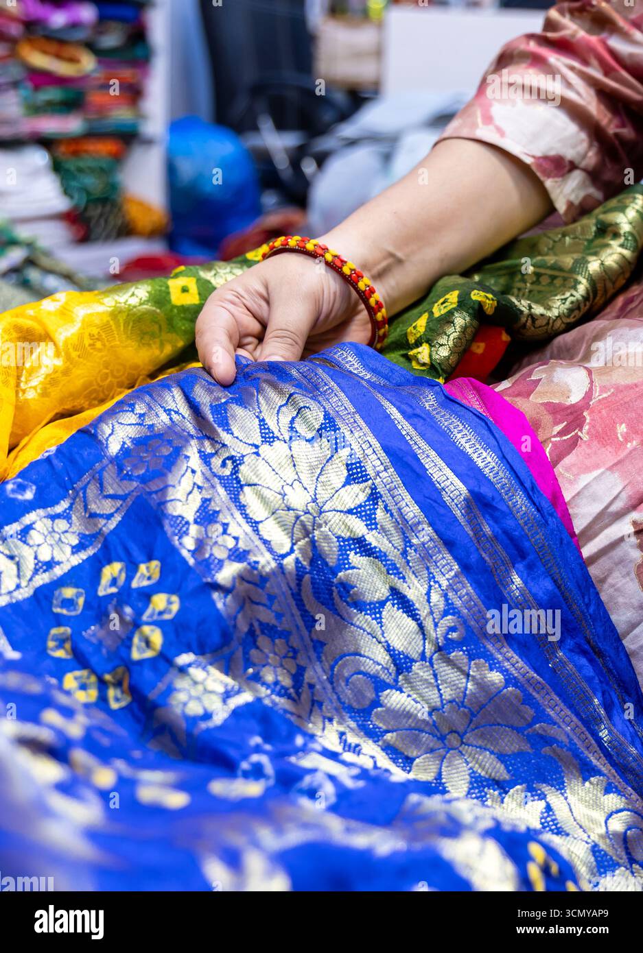 Traditional indian saree selection customer hi-res stock photography ...