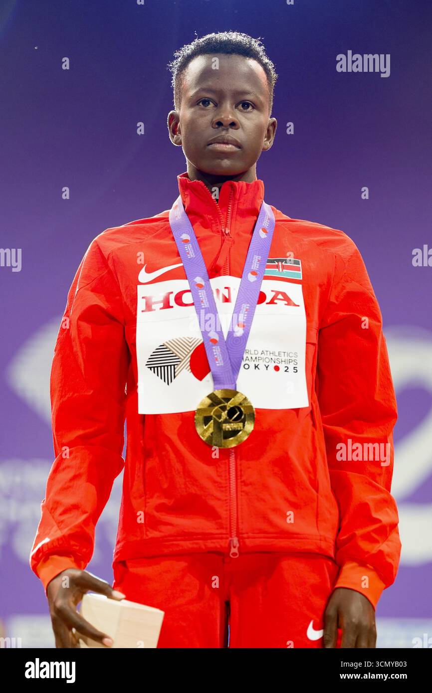 Faith Cherotich of Kenya poses with her gold medal during the medal ...