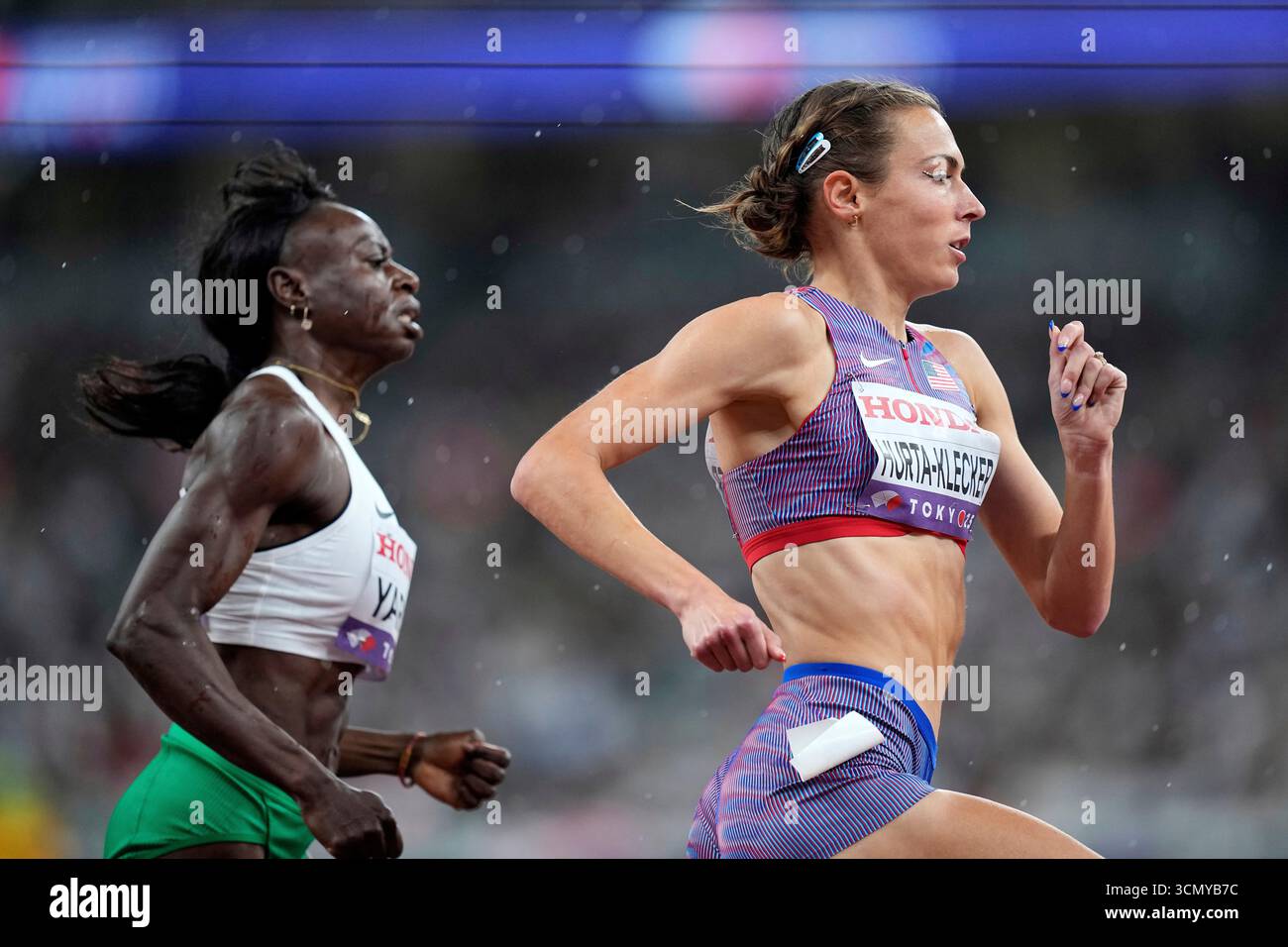 United States' Sage Hurta-Klecker and Benin's Noelie Yarigo race in a a ...