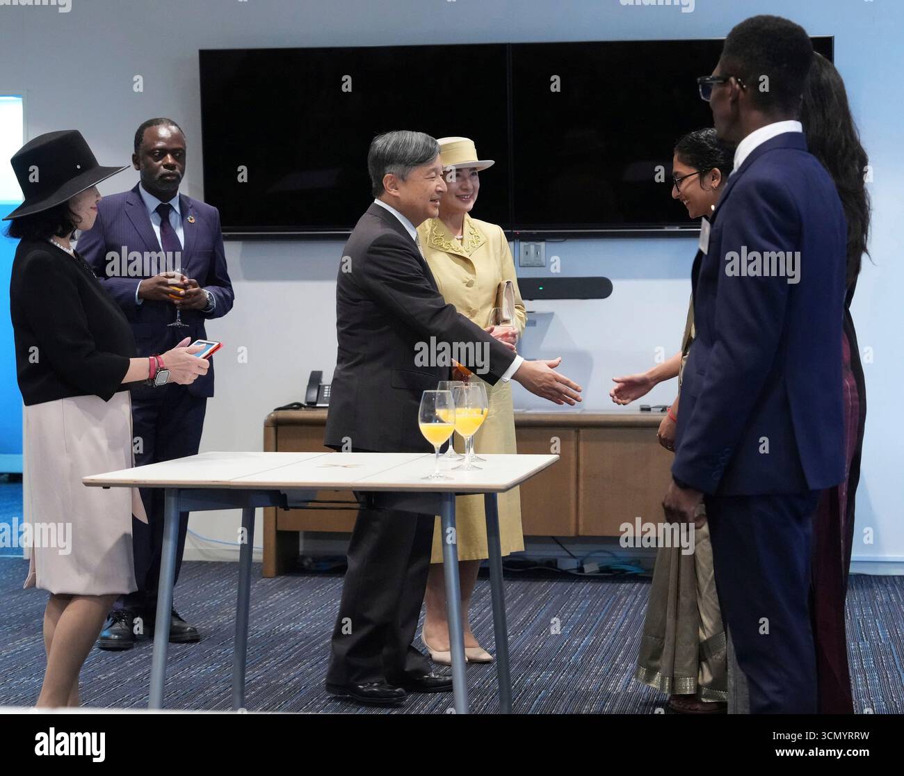 Japan's Emperor Naruhito and Empress Masako talk with graduate students ...