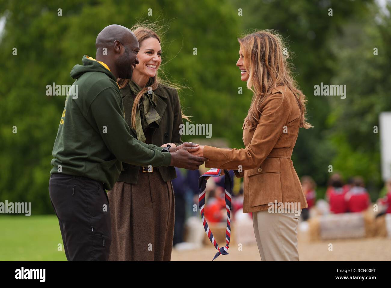 Chief Scout Dwayne Fields presents a Scout scarf to First Lady Melania Trump (right) after she ...