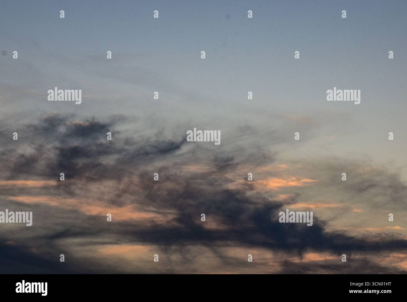 Atmospheric sky with tender sunset tones in soft pastels, showing ...