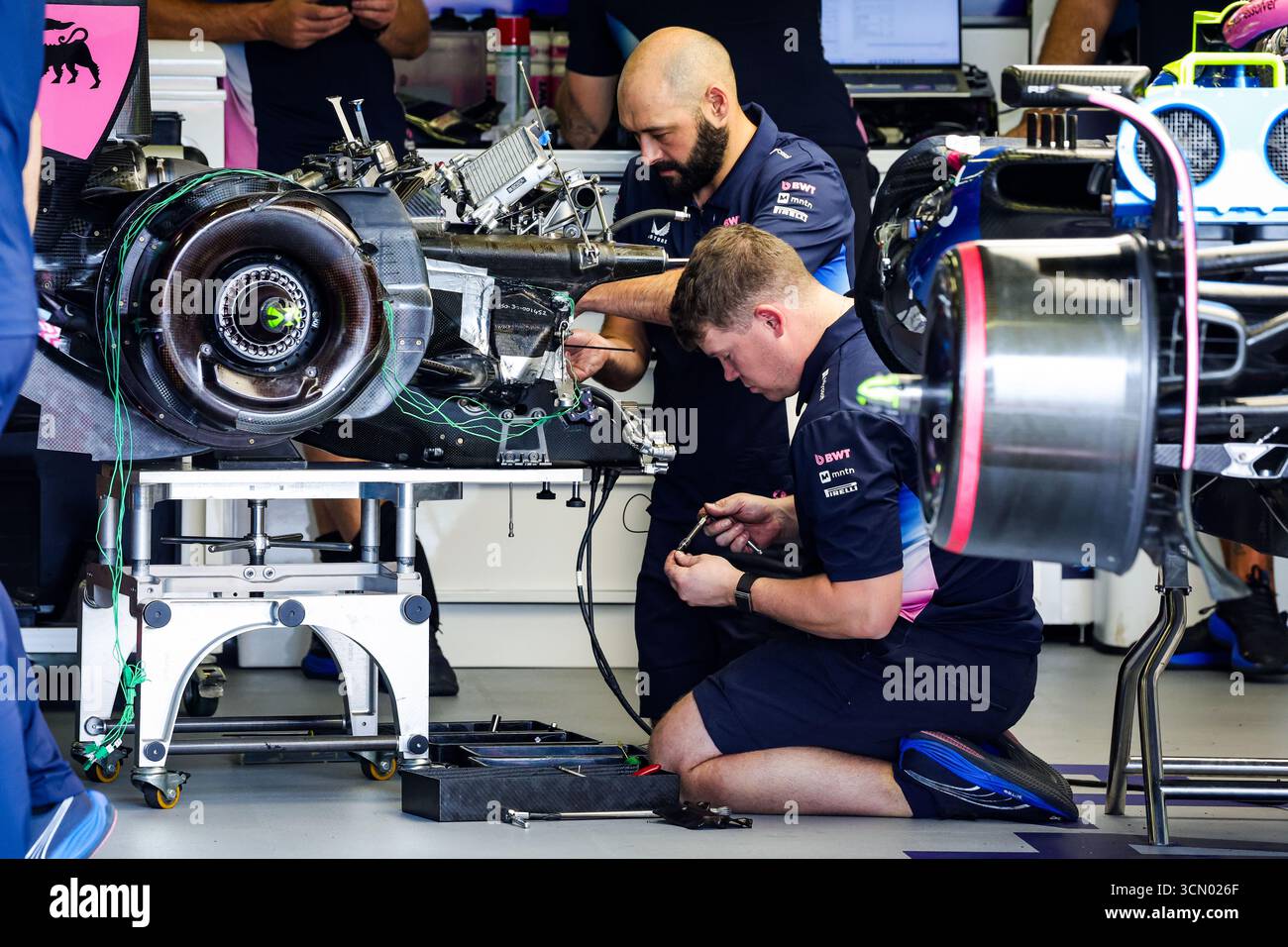 Alpine F1 Team A525, mechanics working on the gearbox during the 2025 ...