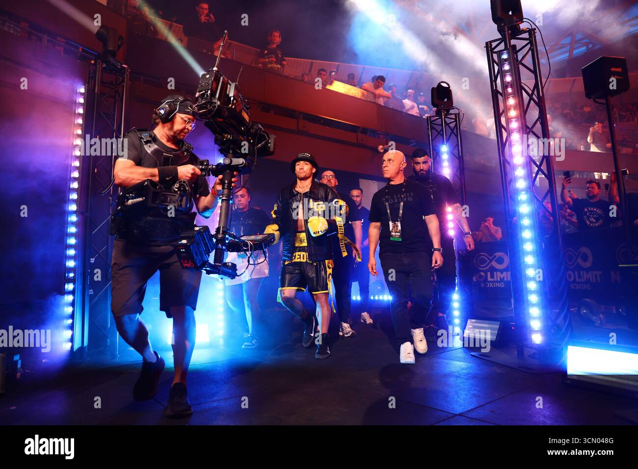 Liam Paro walks in to the arena against David Papot during their IBF ...