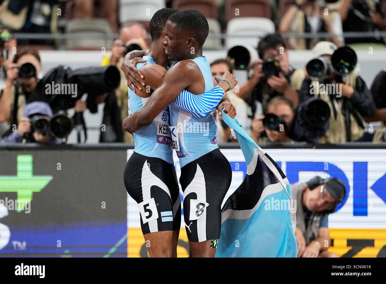 Botswana's Lee Bhekempilo Eppie, left, is congratulated by compatriot ...