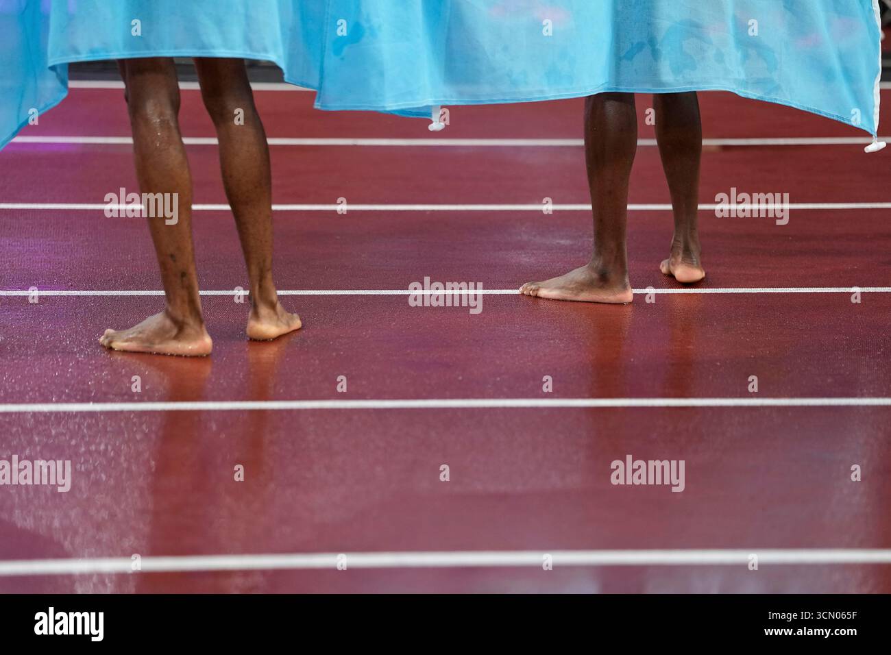 Gold medalist Botswana's Lee Bhekempilo Eppie and compatriot and bronze ...
