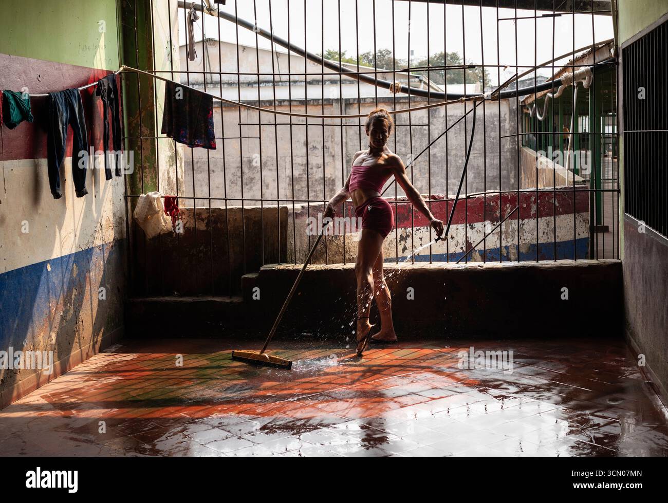 FILE PHOTO GALLERY - Magali Vargas strikes a pose while cleaning the ...