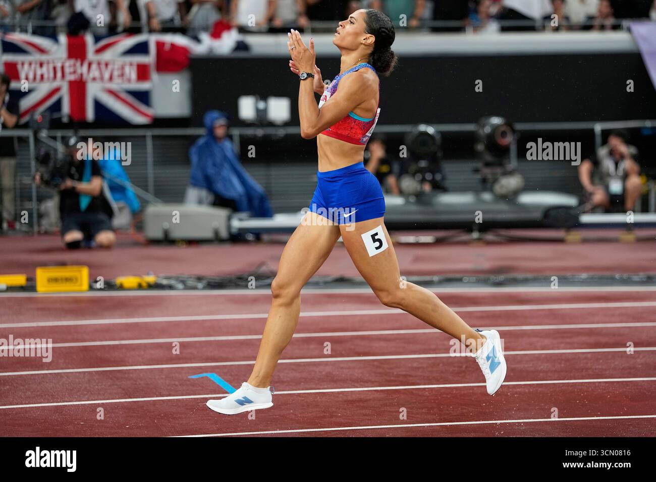 United States' Sydney McLaughlin-Levrone reacts after winning the women ...
