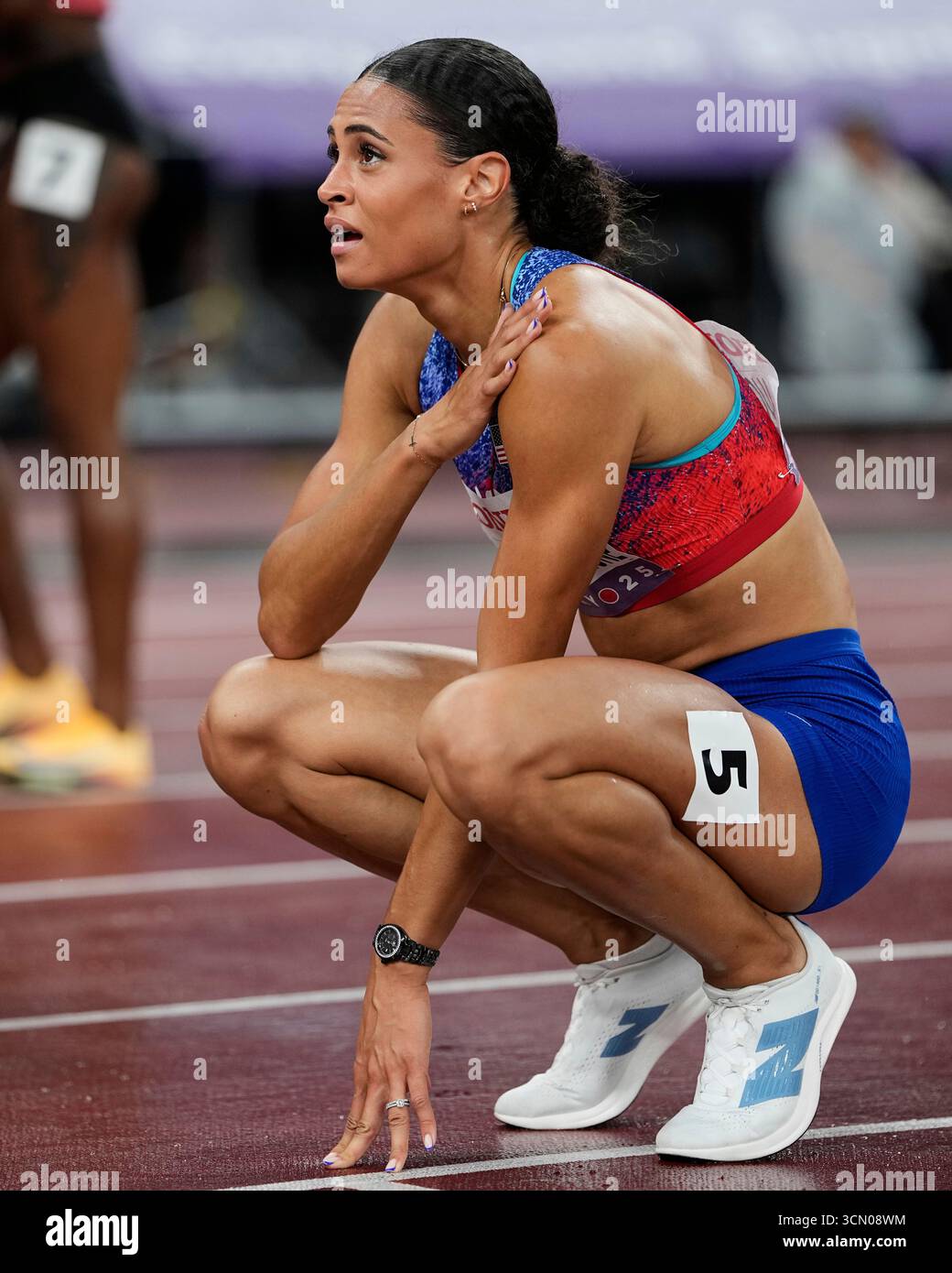 United States' Sydney McLaughlin-Levrone reacts after winning the women ...