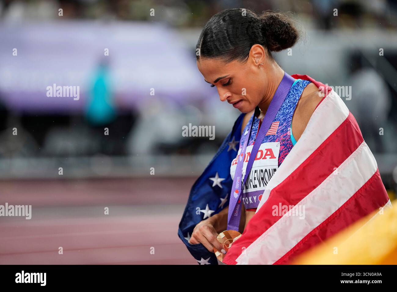 United States' Sydney McLaughlin-Levrone reacts after winning the women ...