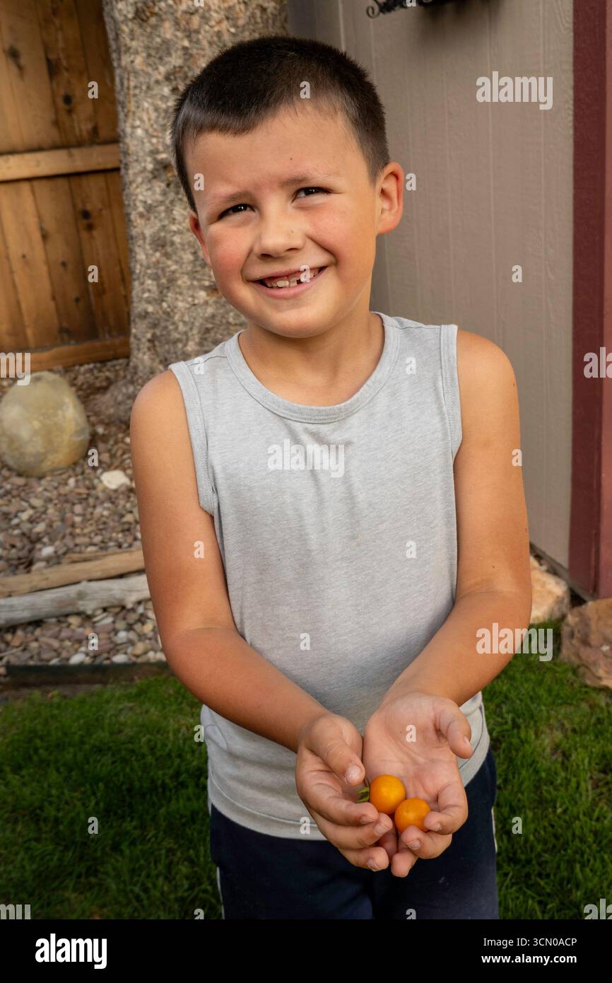 Smiling child shows off hi-res stock photography and images - Alamy