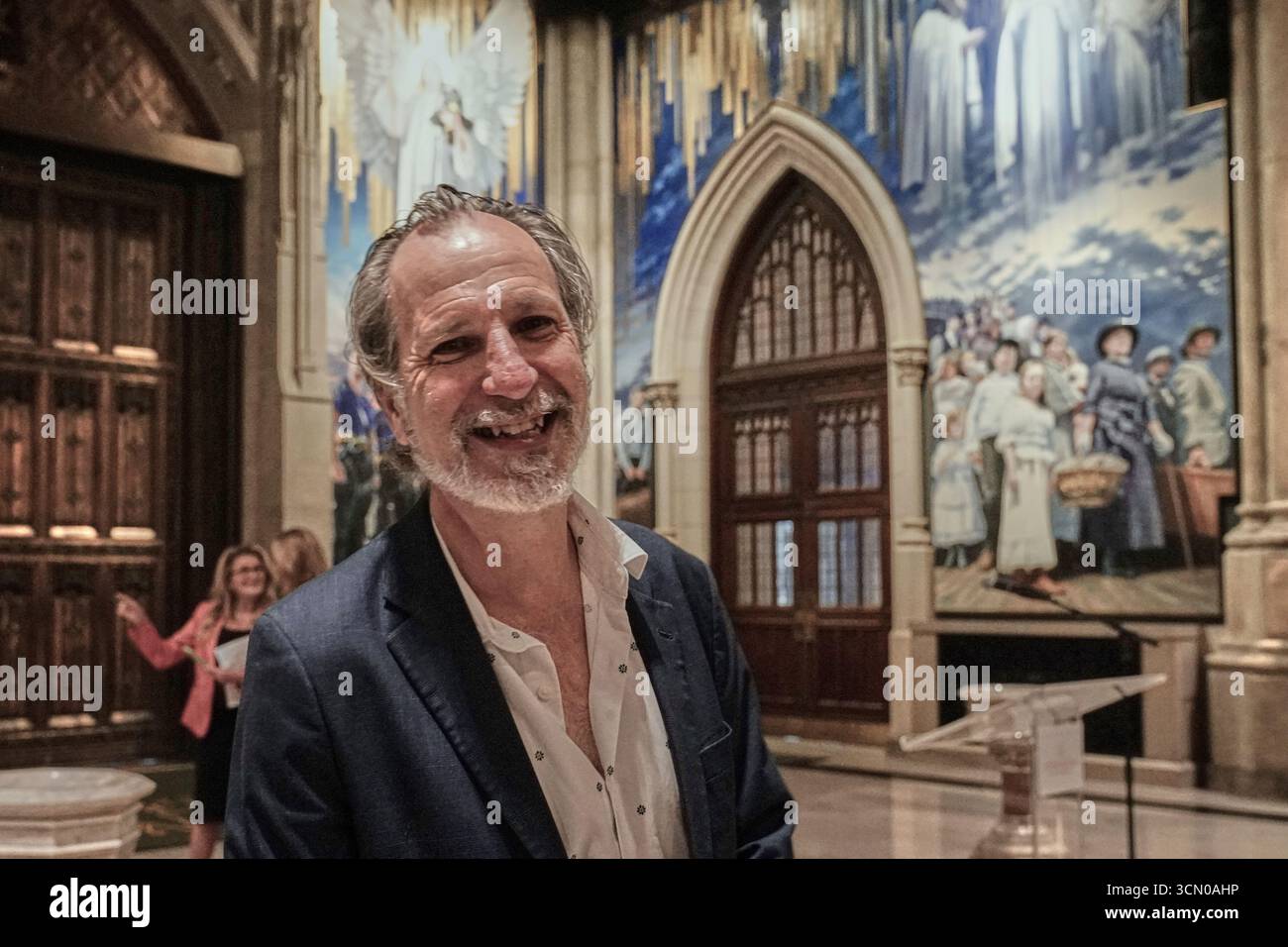 Artist Adam Cvijanovic poses for a photo during the media preview his ...