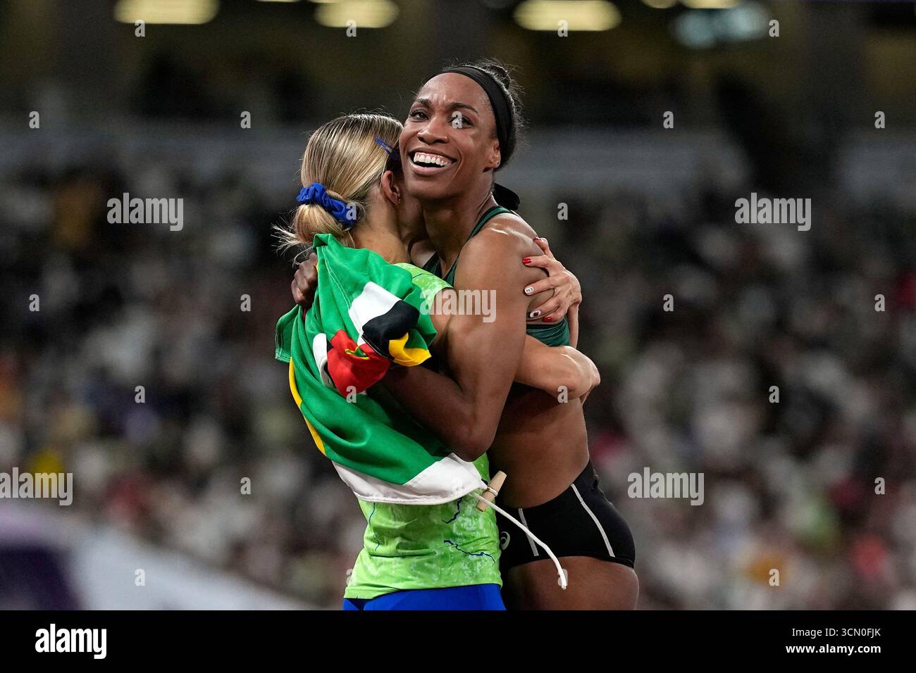 Dominica's Thea Lafond celebrates with Slovenia's Neja Filipic, left ...