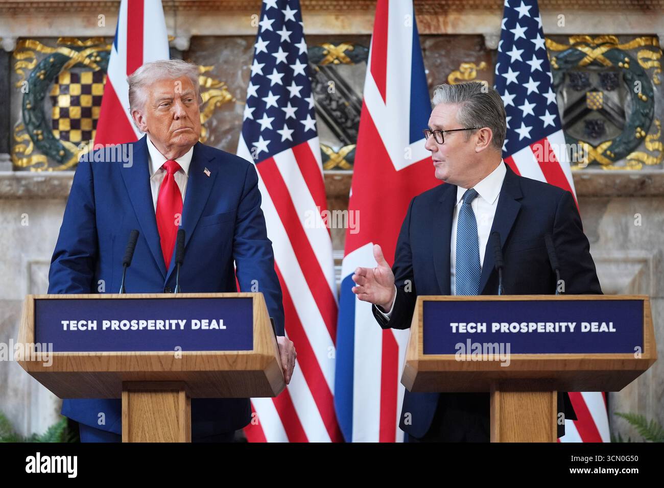 President Donald Trump attends a joint press conference with Britain's ...
