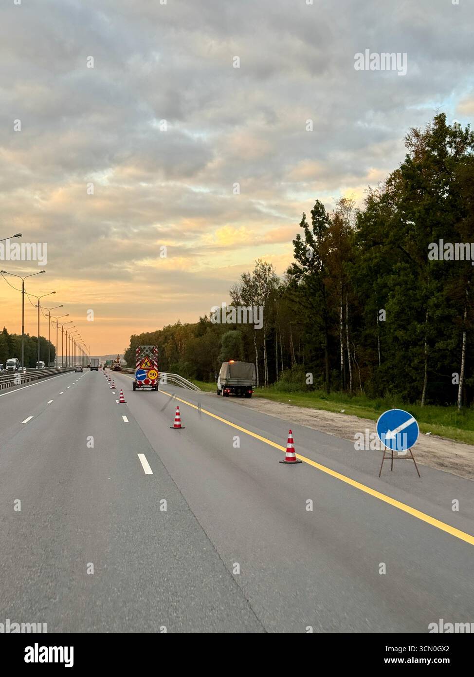 Construction zone, road repairs, sign telling you to turn left. There ...