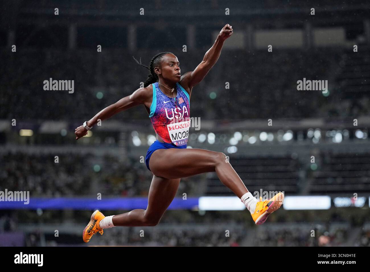 United States' Jasmine Moore makes an attempt in the women's triple ...