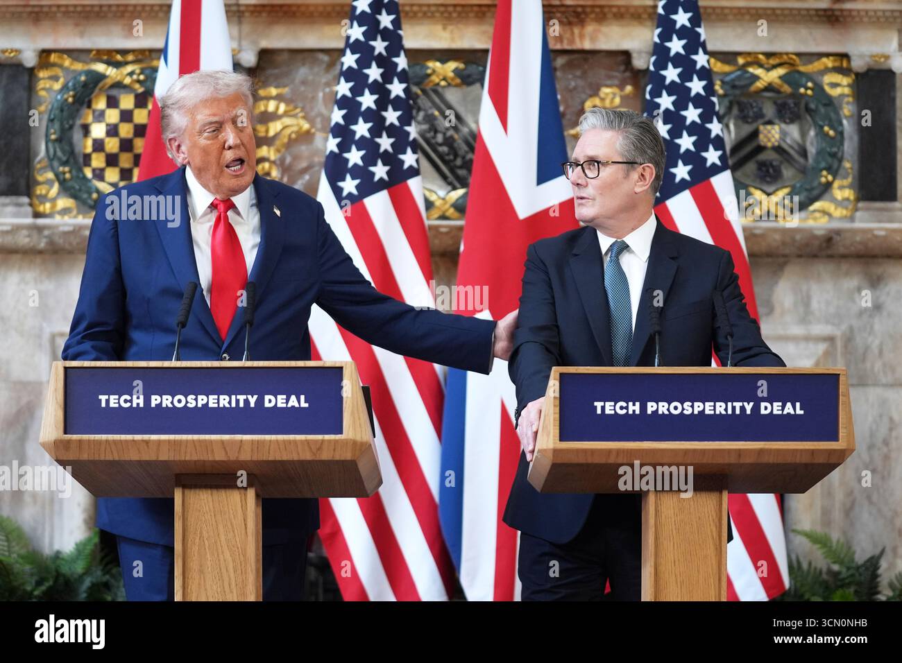 President Donald Trump gestures next to Britain's Prime Minister Keir ...