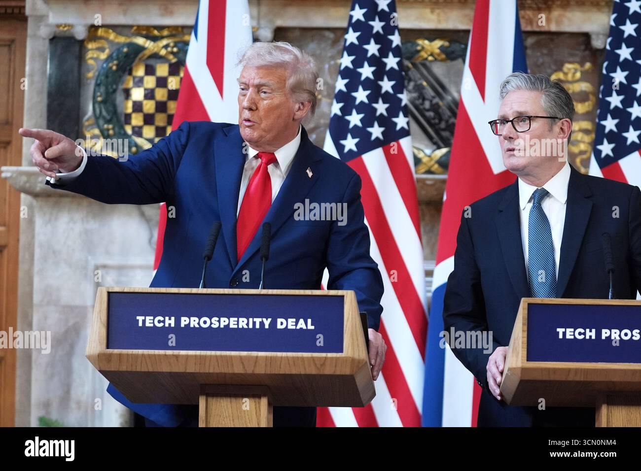 President Donald Trump gestures next to Britain's Prime Minister Keir ...