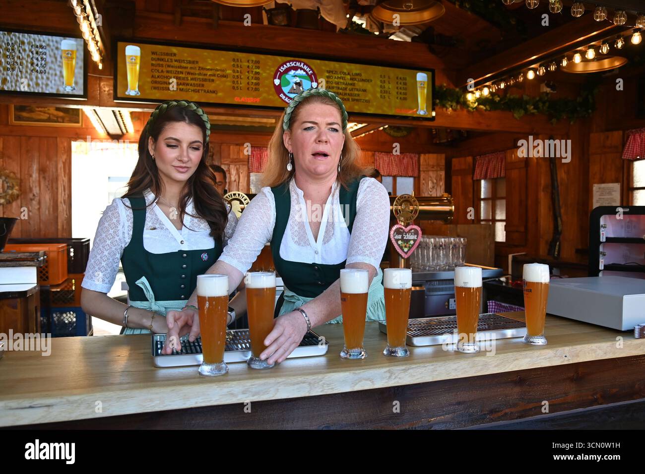 Staff, beer bar, employees in the Isarschaenke, Weissbiergarten. Bar ...