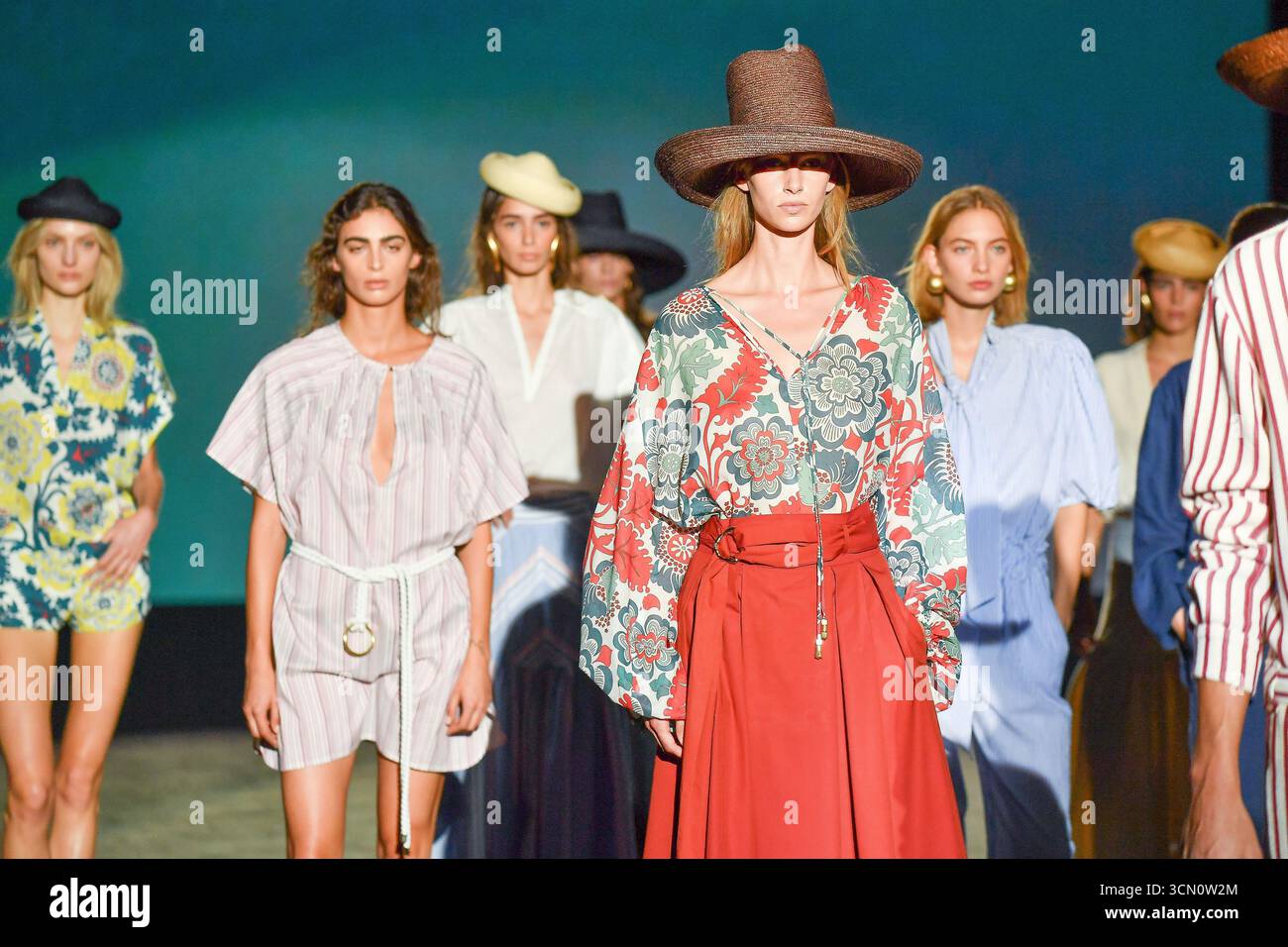 Madrid, Spain. 18th Sep, 2025. Models walk the runway wearing a design ...