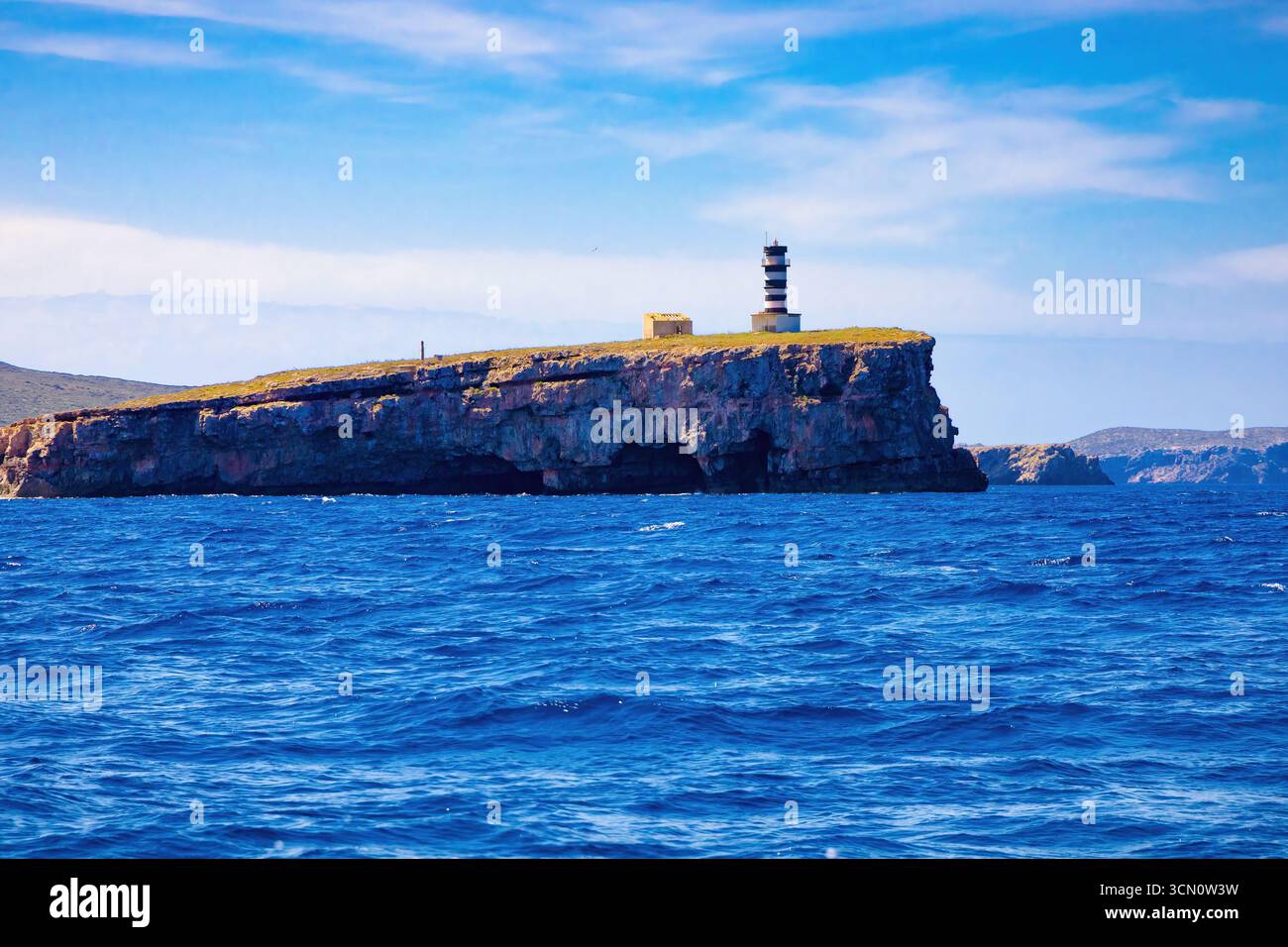 View of one of the nineteen islets that make up the Cabrera archipelago ...