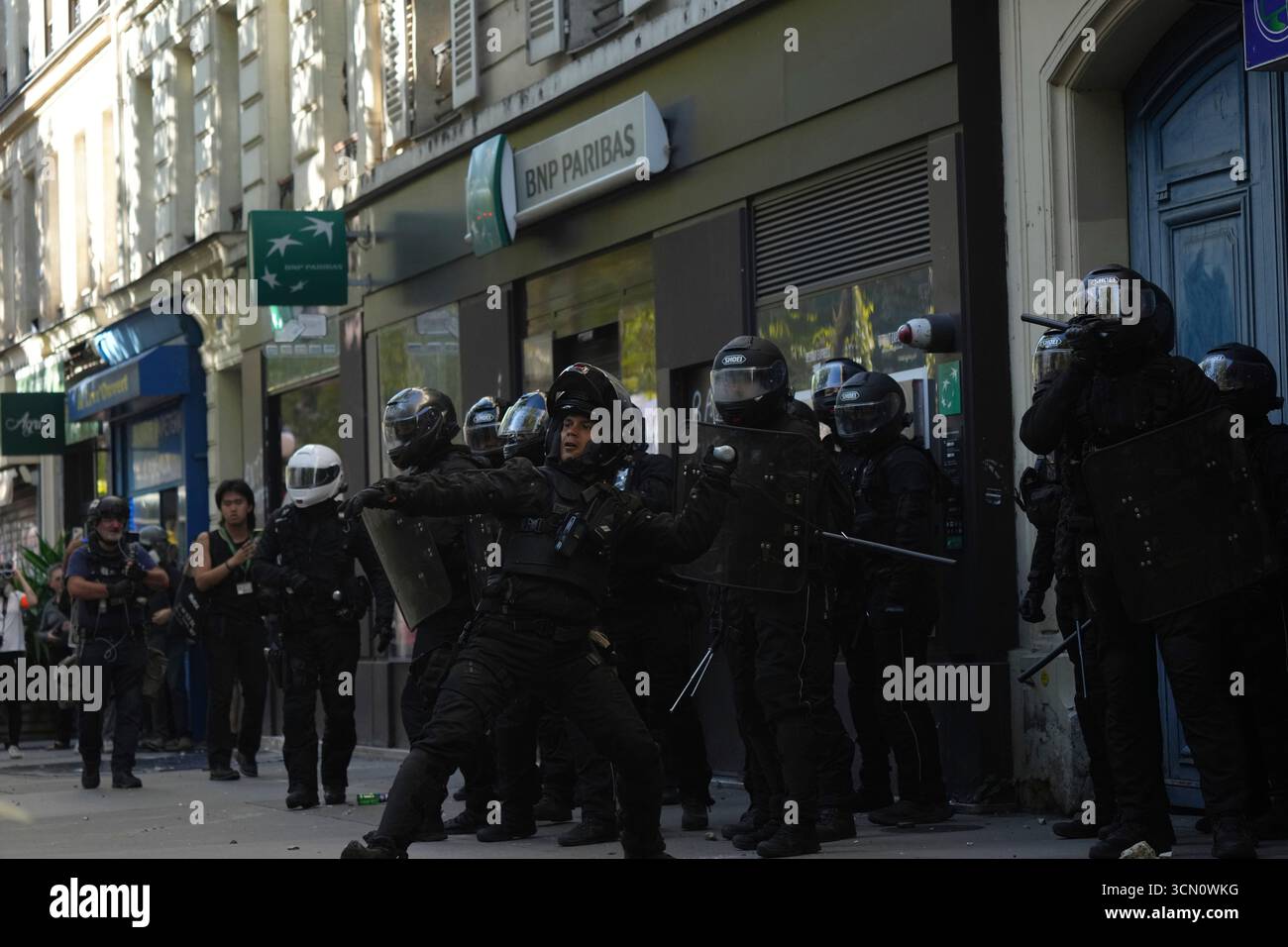 Police officers face protesters during a demonstration called by major ...
