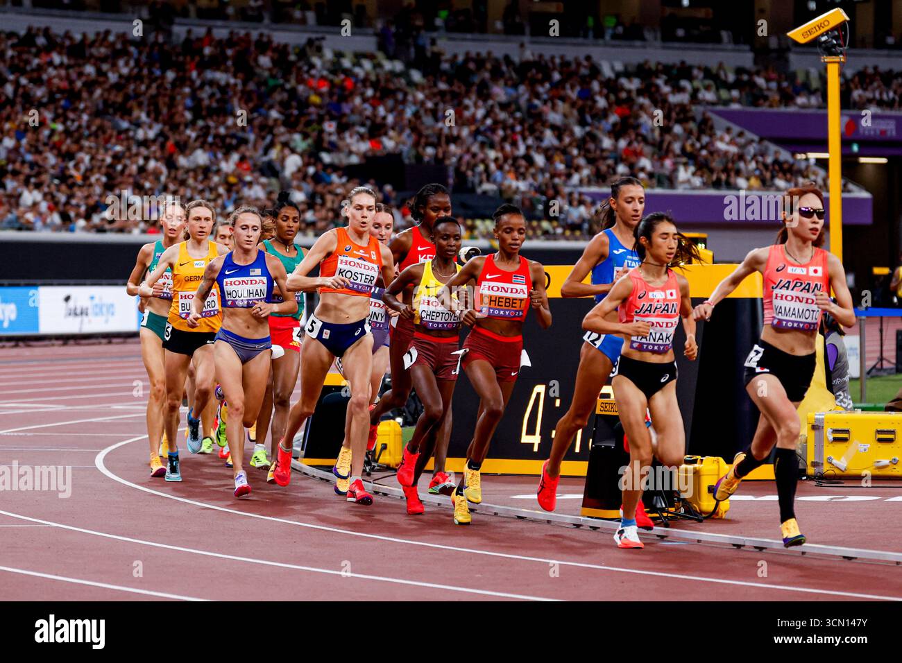 Beatrice Chebet of Kenya and Maureen Koster of the Netherlands ...