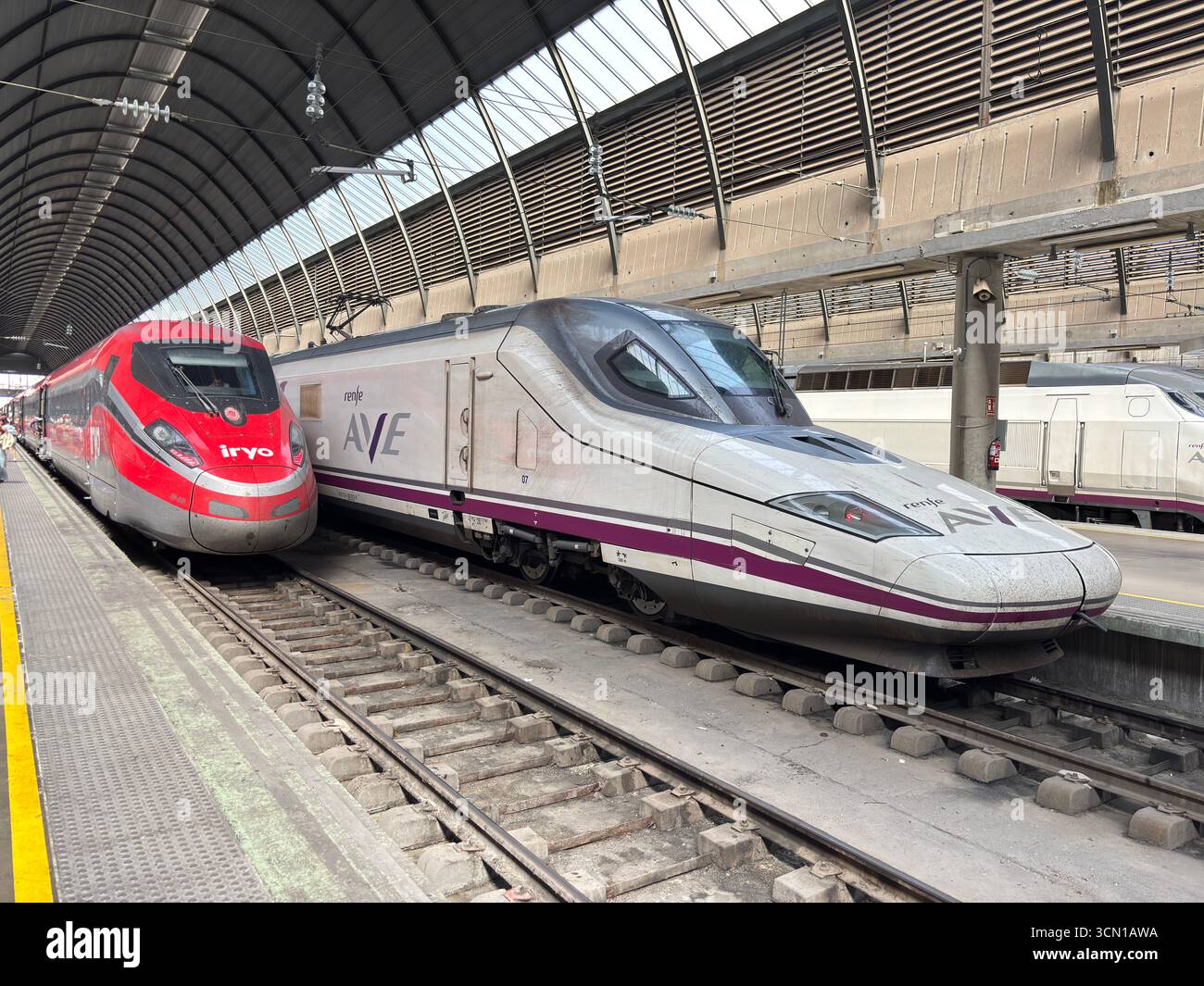 Renfe AVE high-speed trains at Sevilla Santa Justa station in Spain ...