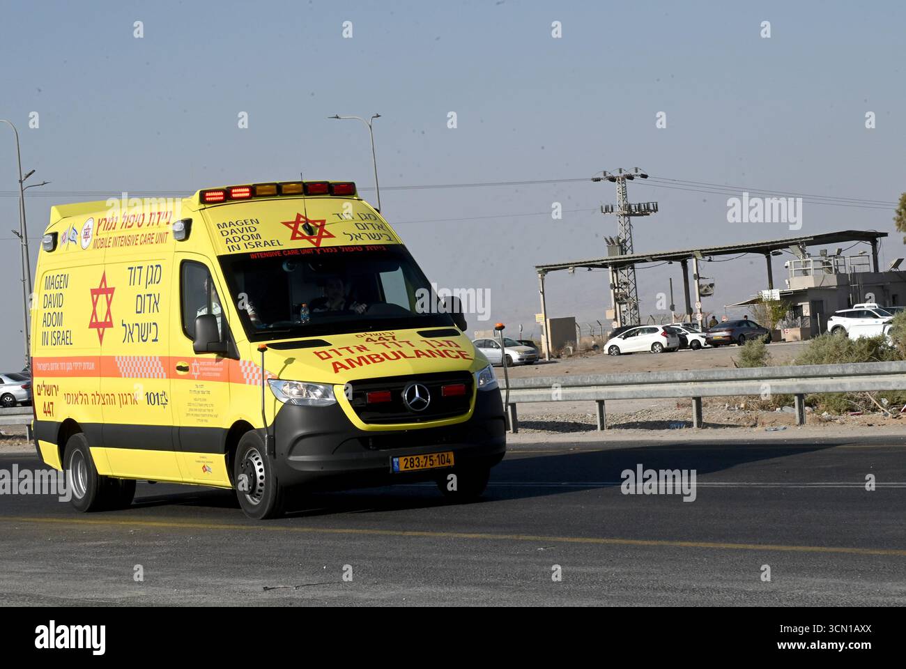 A Magen David Adom ambulance leaves the the King Hussein Bridge Border ...