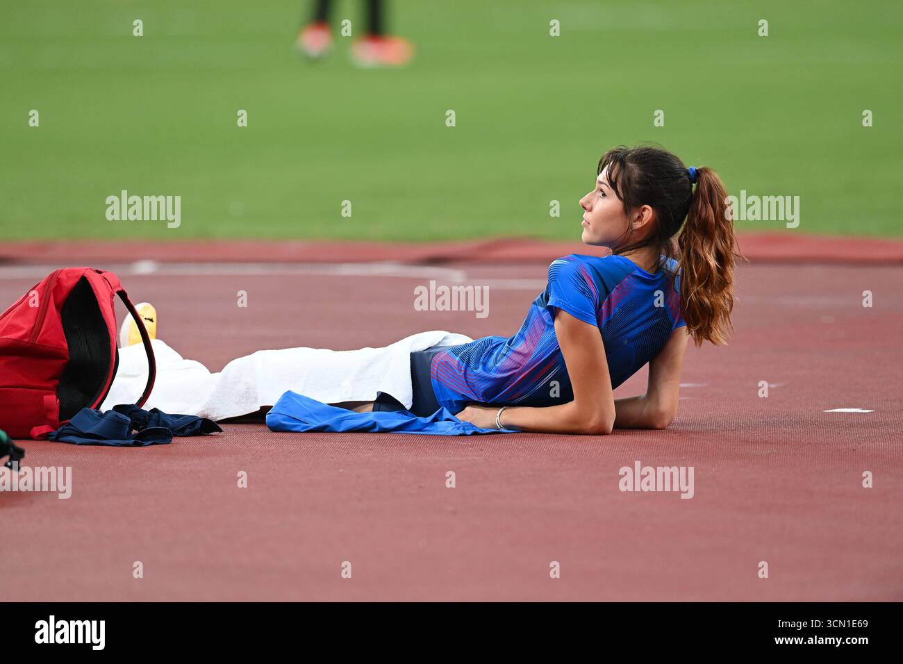 Angelina Topic (Serbia) resting on the ground during the high jump ...