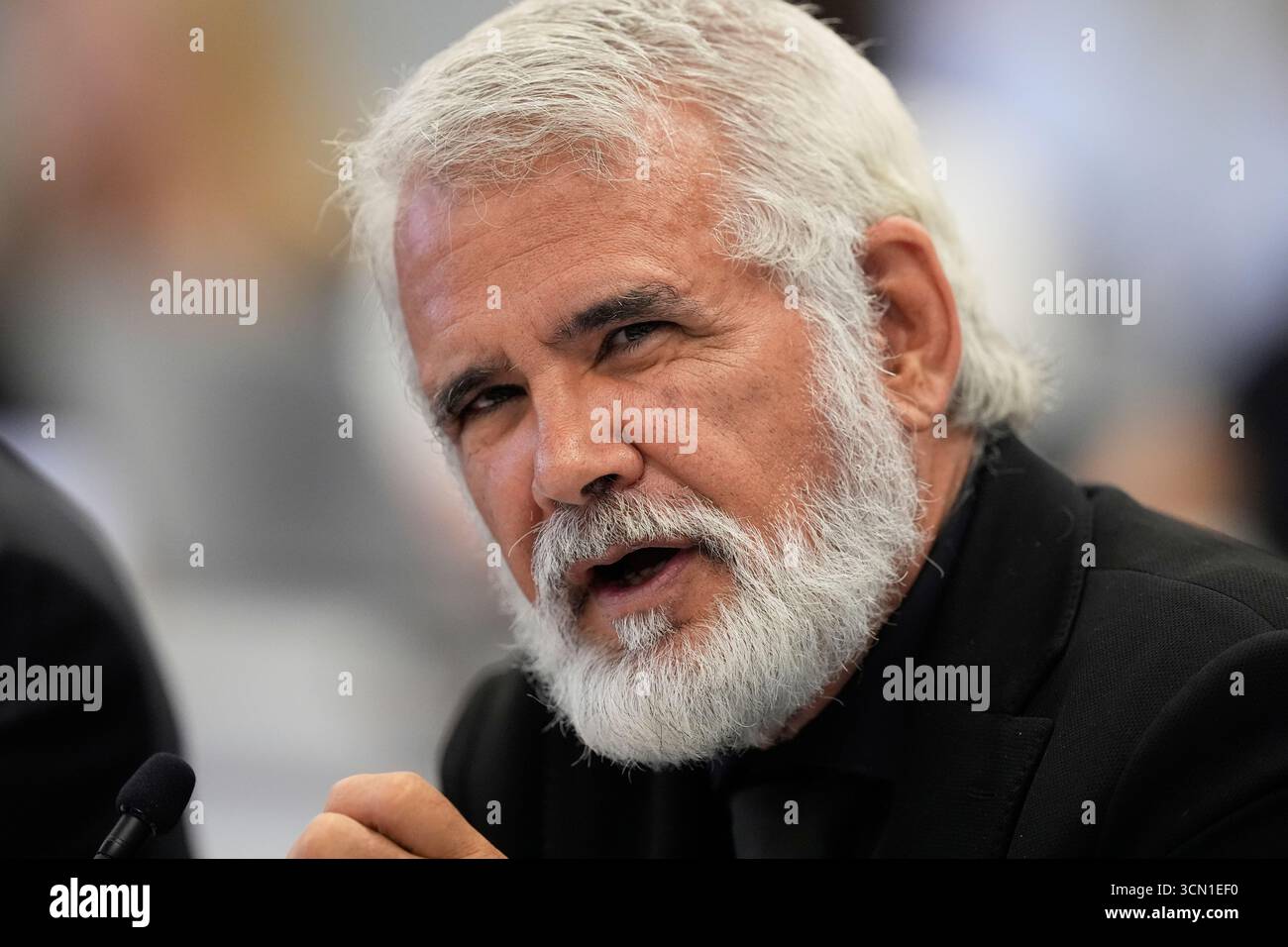 Committee member Dr. Robert Malone speaks during a meeting of the Advisory Committee on ...