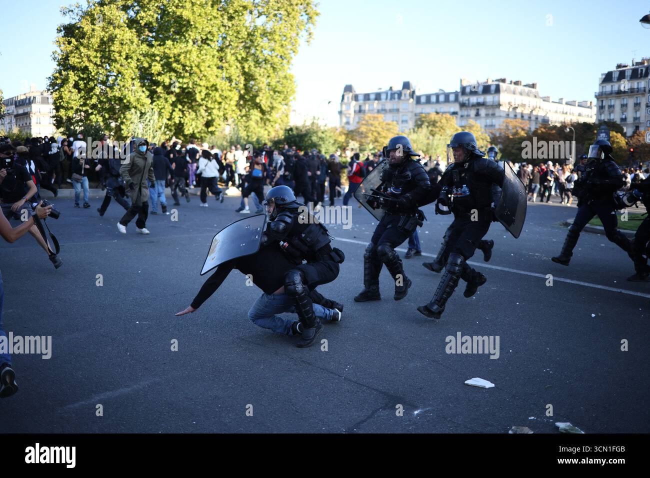 Protesters clash with police during a nationwide strike and protests ...