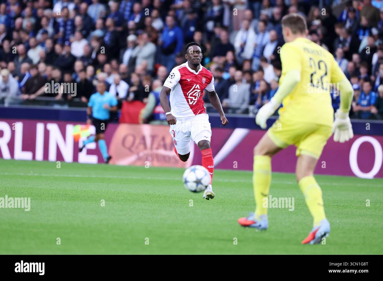 Monaco's Folarin Balogun, left, makes an attempt as Brugge's goalkeeper ...