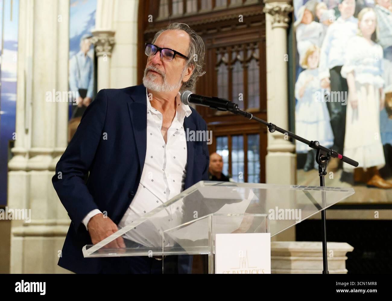 Artist Adam Cvijanovic speaks when he and Cardinal Timothy Dolan unveil ...
