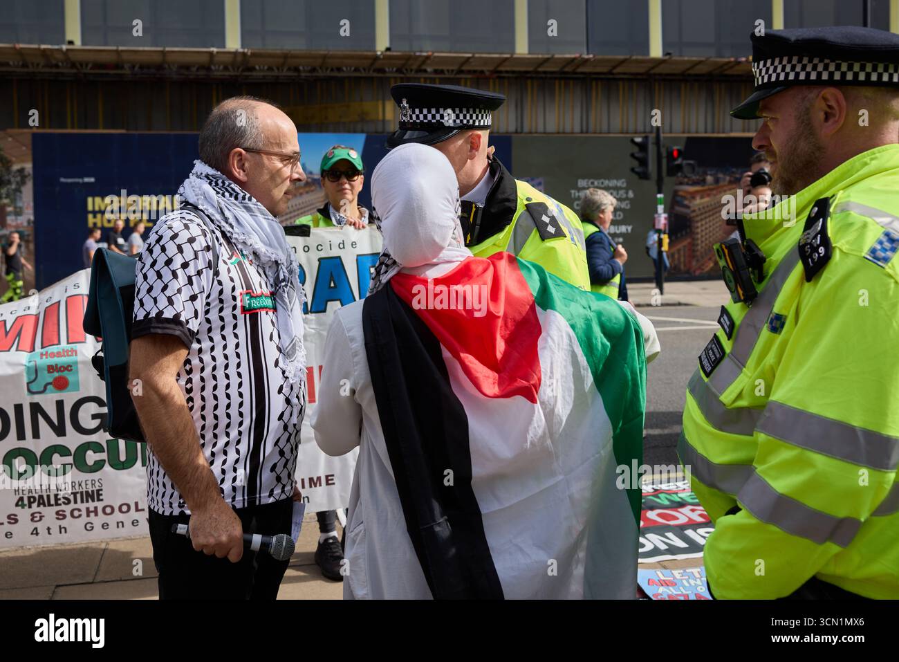 Dr Nick Maynard confronted by metropolitan police at the march for ...