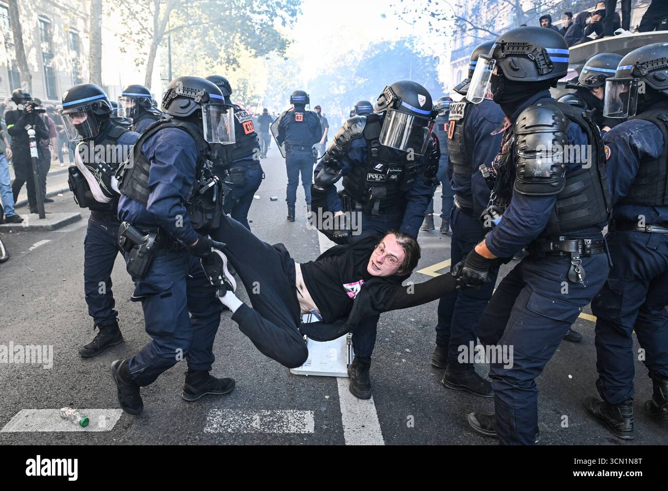 Clashes occur between French riot police and protesters during a ...